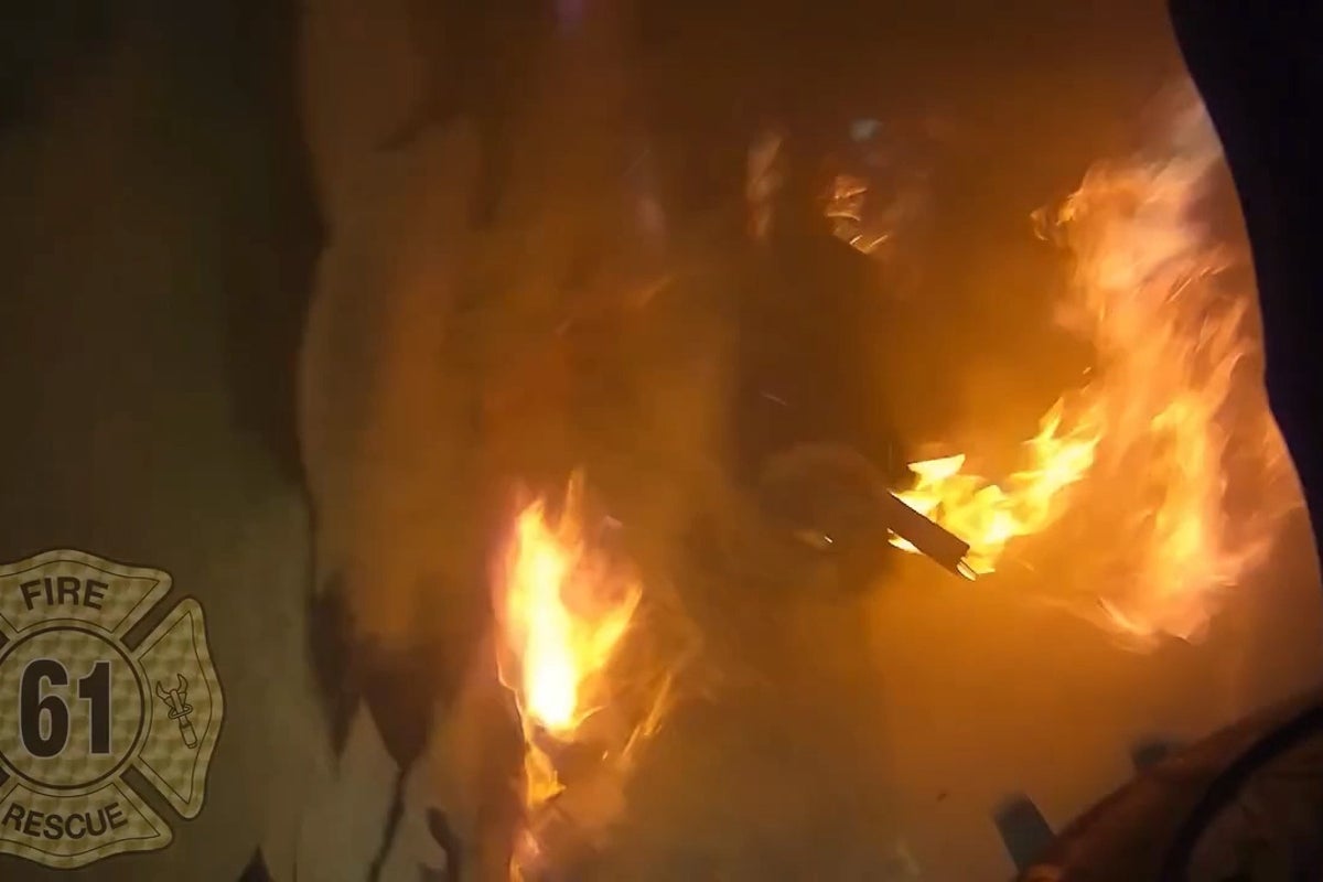 Firefighter falls 13ft through floor of burning building – but survives ...