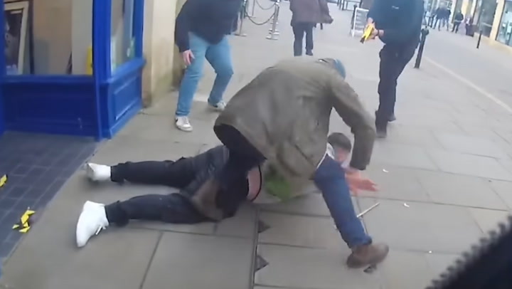 Gang of masked phone thieves burst into O2 store in violent high street ...